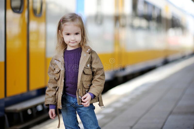 Little Girl Waiting for Train on Railway Station Stock Photo - Image of ...