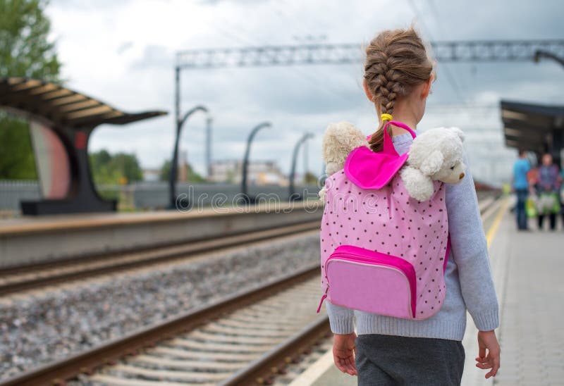 Little Girl Waiting for Train. Stock Image - Image of rails, back: 56933773