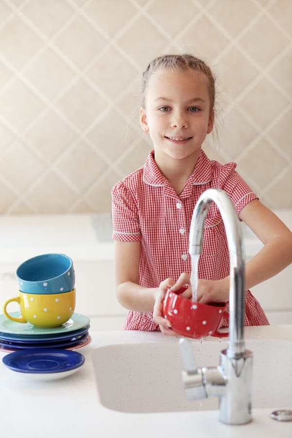 Little Girl Washing the Dishes Stock Photo - Image of lifestyle, dishes ...