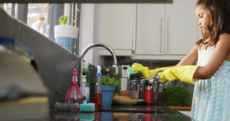 Girl Washing Utensils in the Kitchen 4K 4k Stock Footage - Video of ...