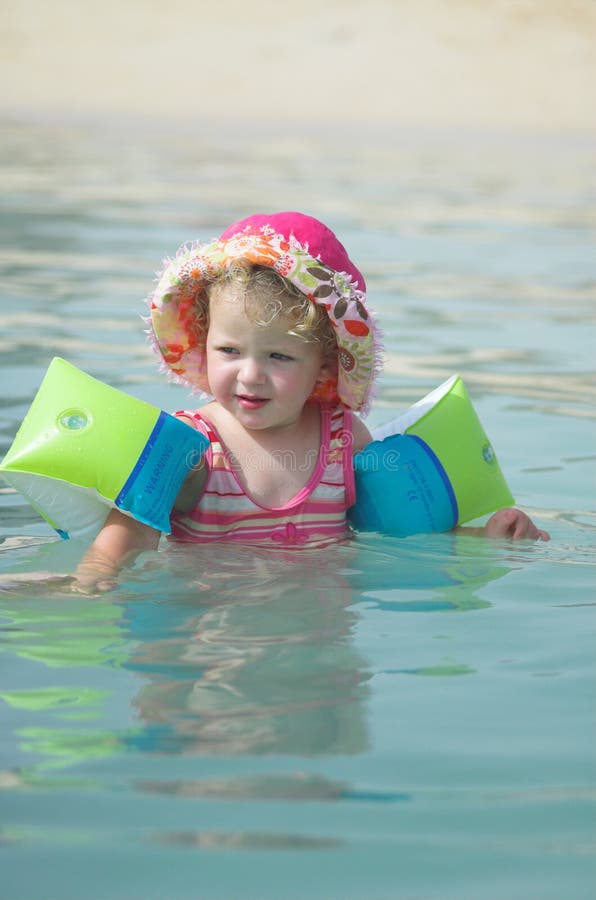 Little girl in the water 2 stock photo. Image of clear - 3539220
