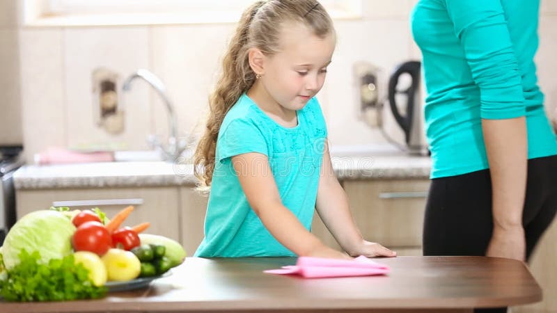 Little Girl Wiping the Table Stock Video - Video of happy, people: 74818239