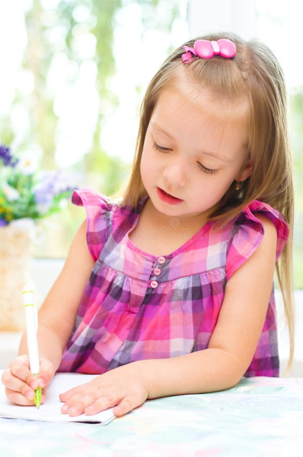Little girl writing stock image. Image of caucasian, inside - 34581623