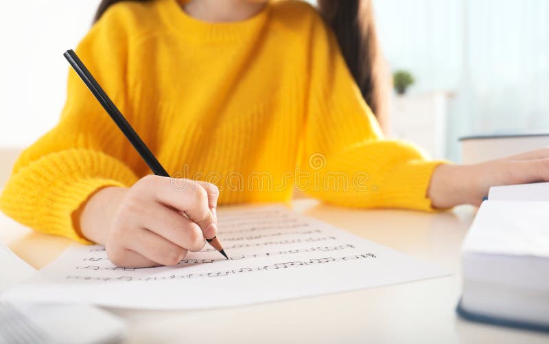 Little Girl Writing Music Notes at Table Stock Image - Image of person ...