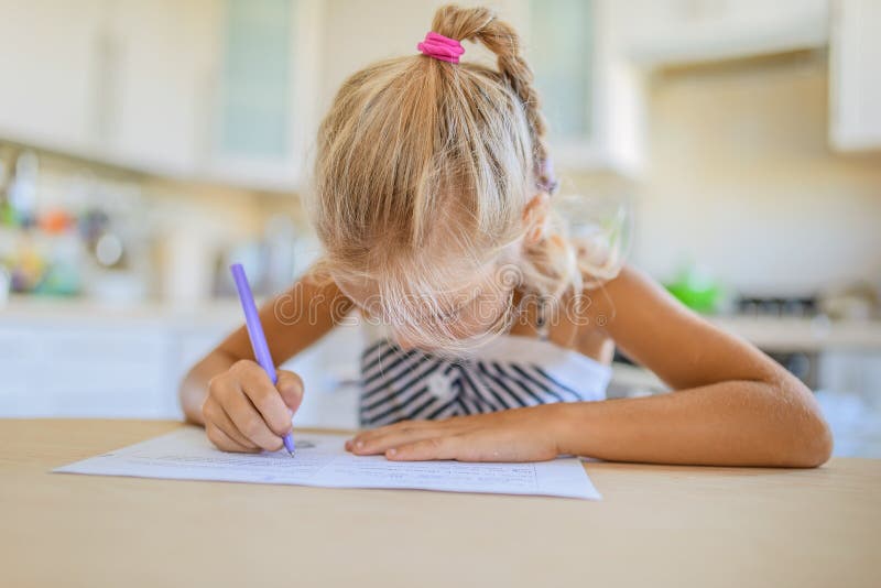Little Girl Writing with Pen in Notebook Stock Photo - Image of female ...