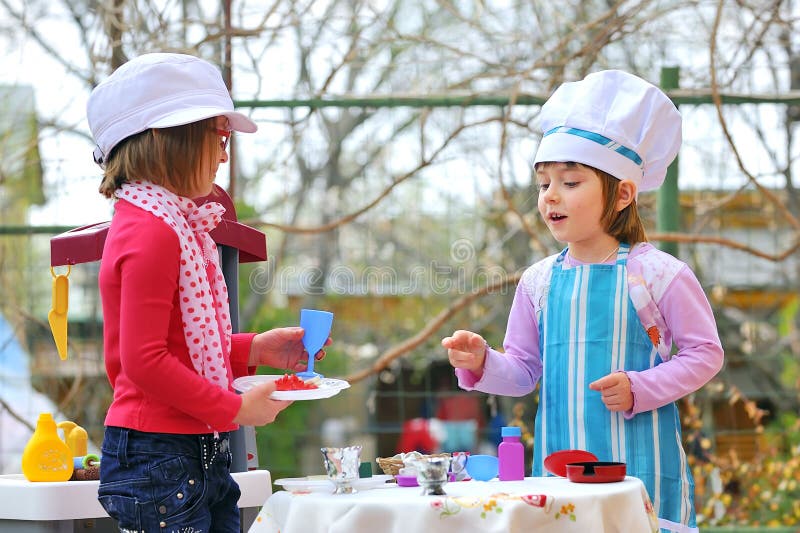 Little Girls Having Fun Playing Cooking Stock Photo - Image of food ...
