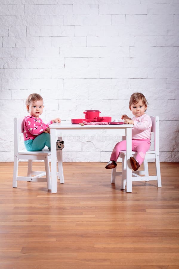 Little Girls Play on the Table Stock Image - Image of smiling, person ...