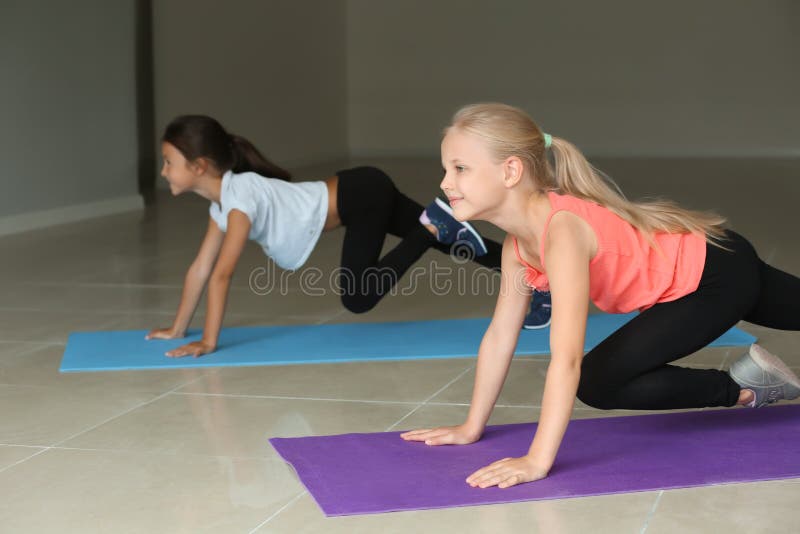 Little Girls Practicing Yoga Indoors Stock Photo - Image of activity ...