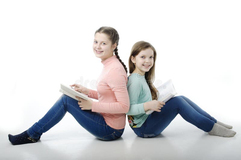 Little Girls Read Books Back To Back on White Stock Photo - Image of ...