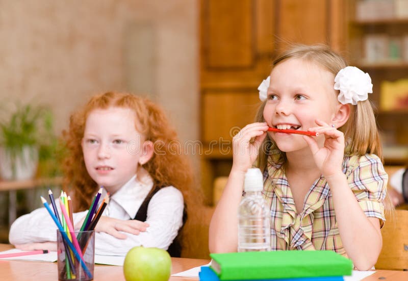 Little Girls Sitting and Studying at School Class Stock Photo - Image ...
