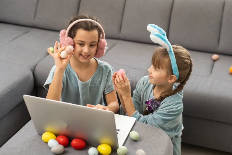 Little Girls Using Computer Together Preparing for Easter Stock Image ...