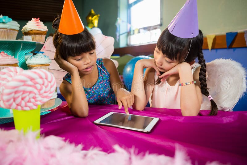 Little Girls Using Tablet at Party Stock Image - Image of domicile ...