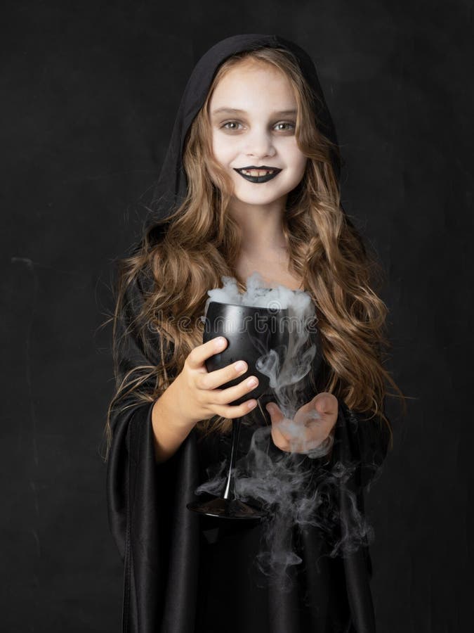 Little Halloween Witch with Potion Stock Image - Image of magic, dress ...
