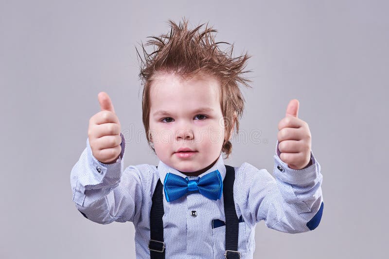 Little Handsome Boy in the Bow Tie Shows `class` Stock Photo - Image of ...