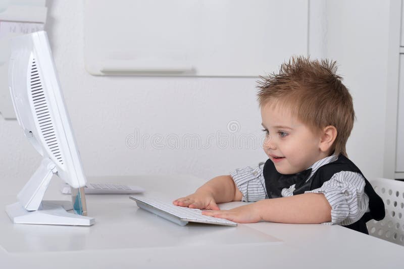 Little Handsome Boy Sits with a Computer Stock Photo - Image of cartoon ...