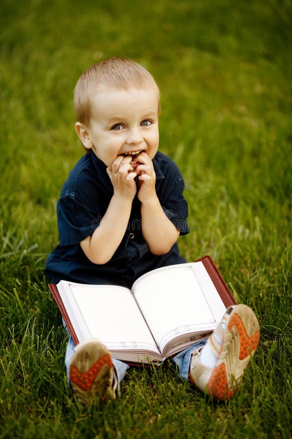 Little happy boy with book stock photo. Image of lifestyle - 28246640