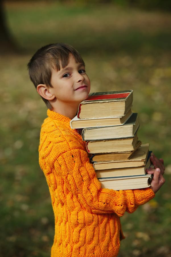 Little Happy Boy Carrying Stack of Books Stock Image - Image of books ...
