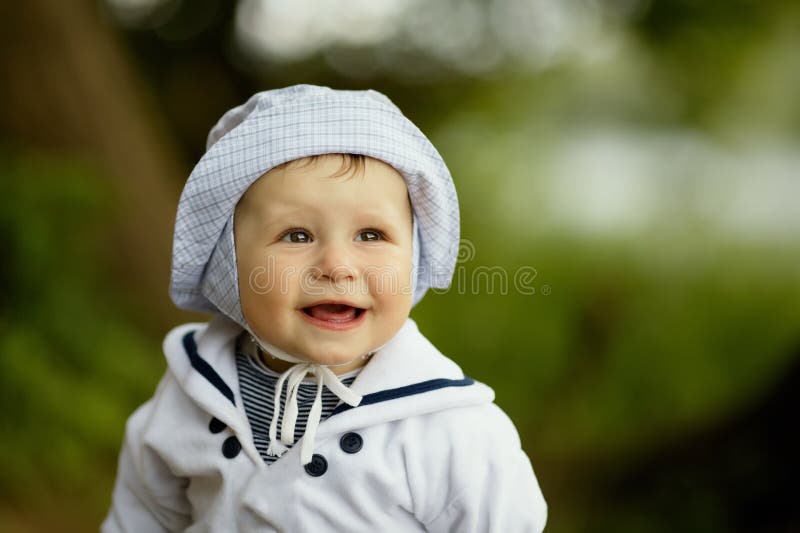 Little happy boy portrait stock image. Image of grass - 32826167