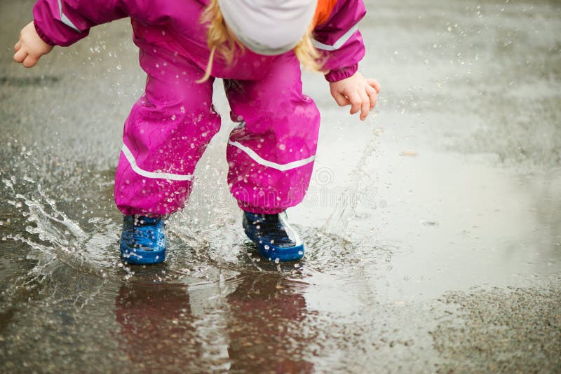 Little Happy Girl Jumping in Puddle Stock Image - Image of city ...