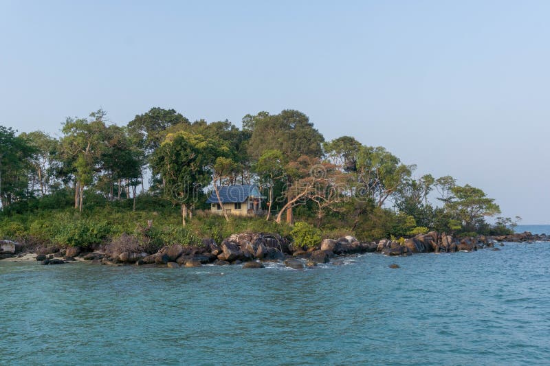 Little House Alone in an Island, Surrounded by Vegetation Stock Photo ...