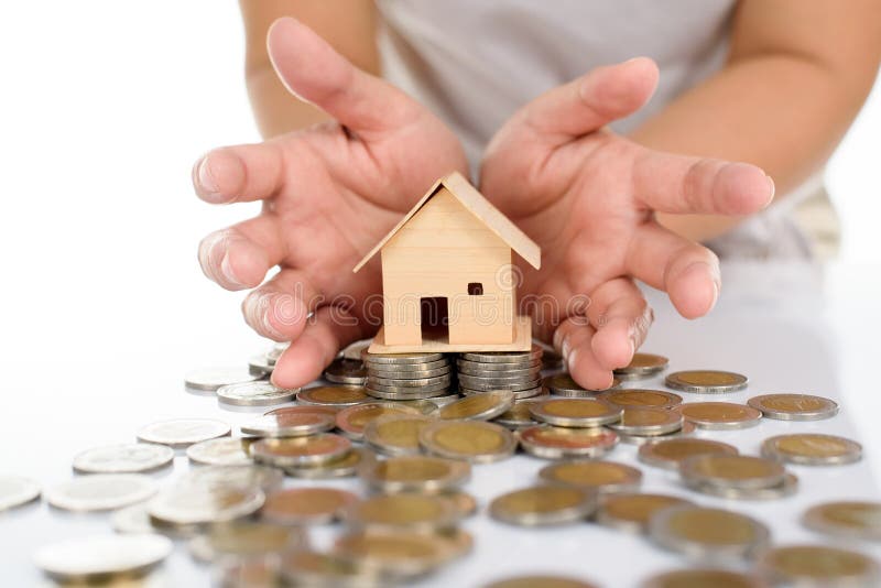 Little House on a Coin and Hand Stock Image - Image of metal, hand ...