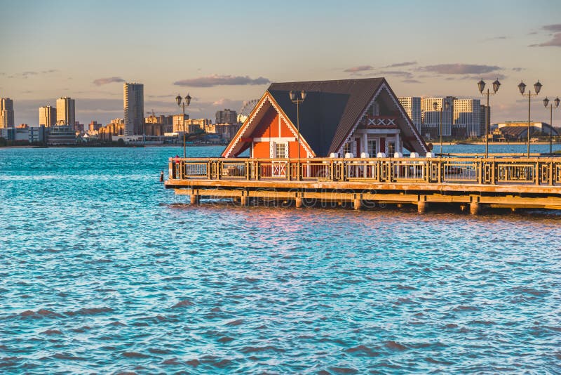 Little House with Red Walls on the Pier in the Bay Stock Photo - Image ...