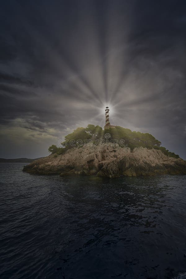 Little Island with a Lighthouse Stock Photo - Image of light, panoramic ...
