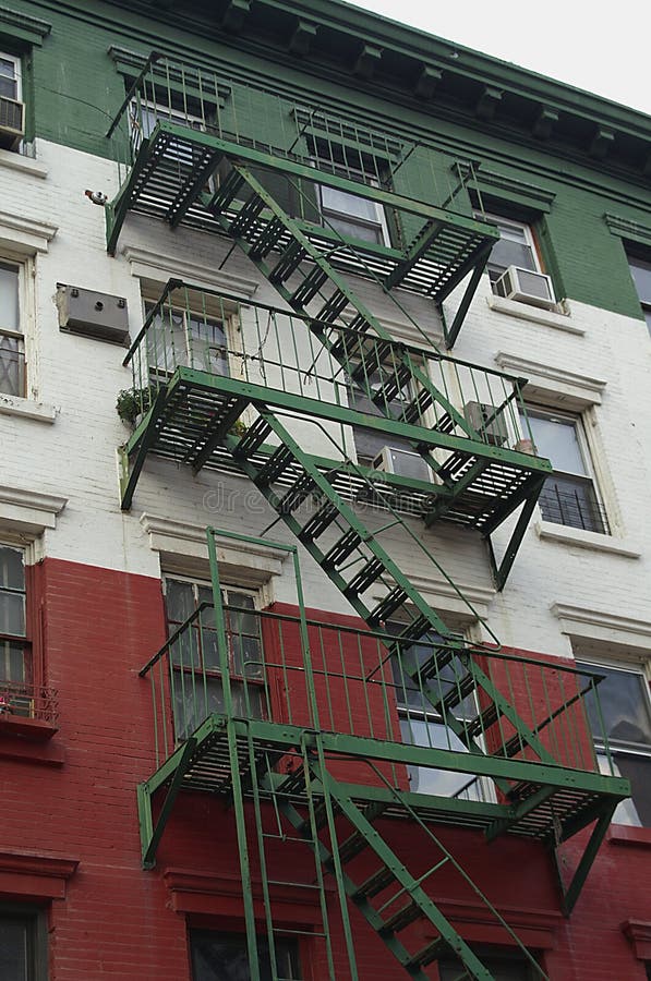 Colorful Apartment Buildings with Fire Escapes Stock Image - Image of ...