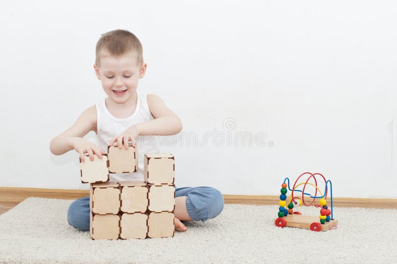 Little Kid is Building Tower Stock Image - Image of little, education ...