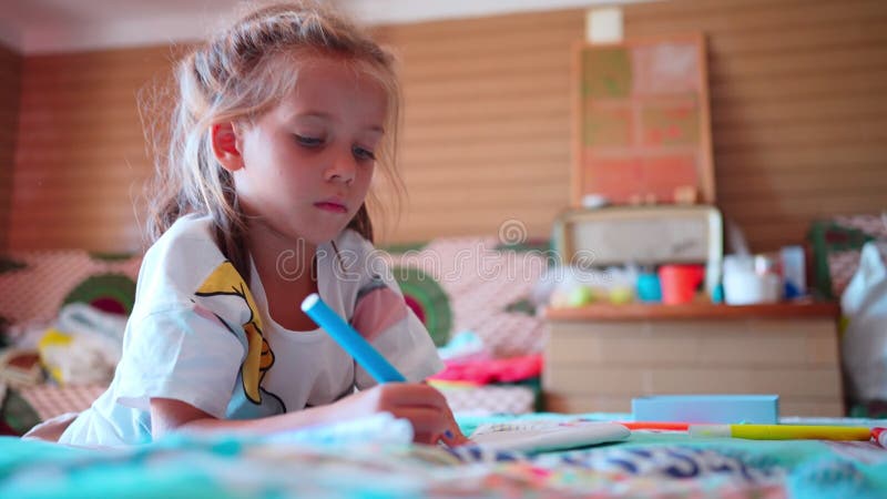 Little Kid Girl Draw or Writing in Diary by Pencil. Stock Footage ... Little Kid Girl Draw or Writing in Diary by Pencil. Stock Footage ...