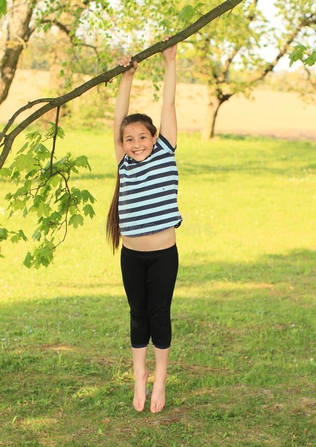 Little Kid - Girl Hanging on Branch Stock Image - Image of childhood ...