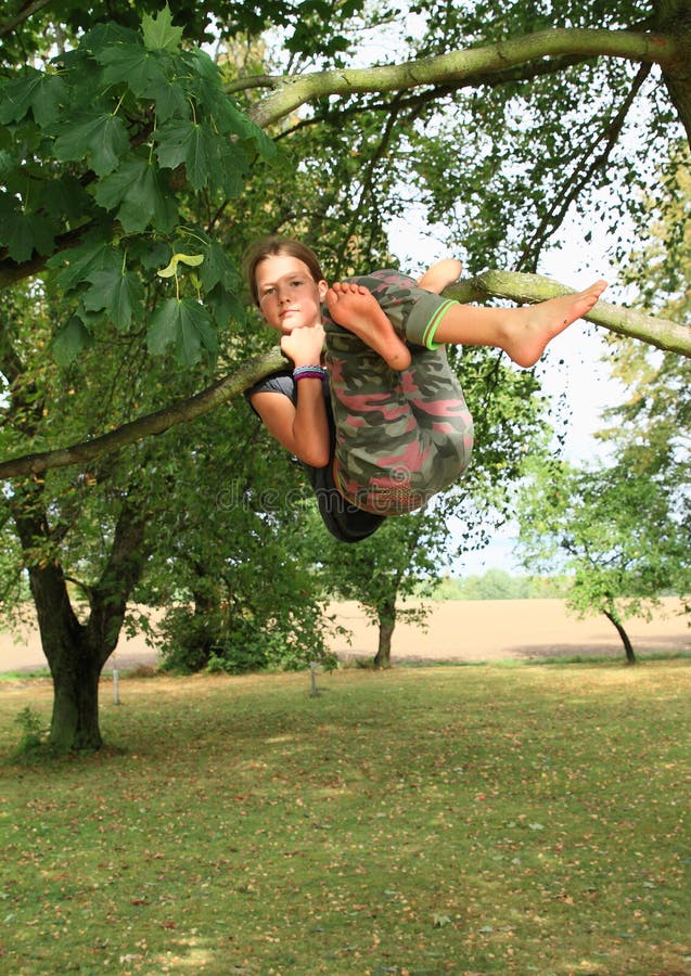 Little Kid - Girl Hanging on Branch Stock Photo - Image of girl ...