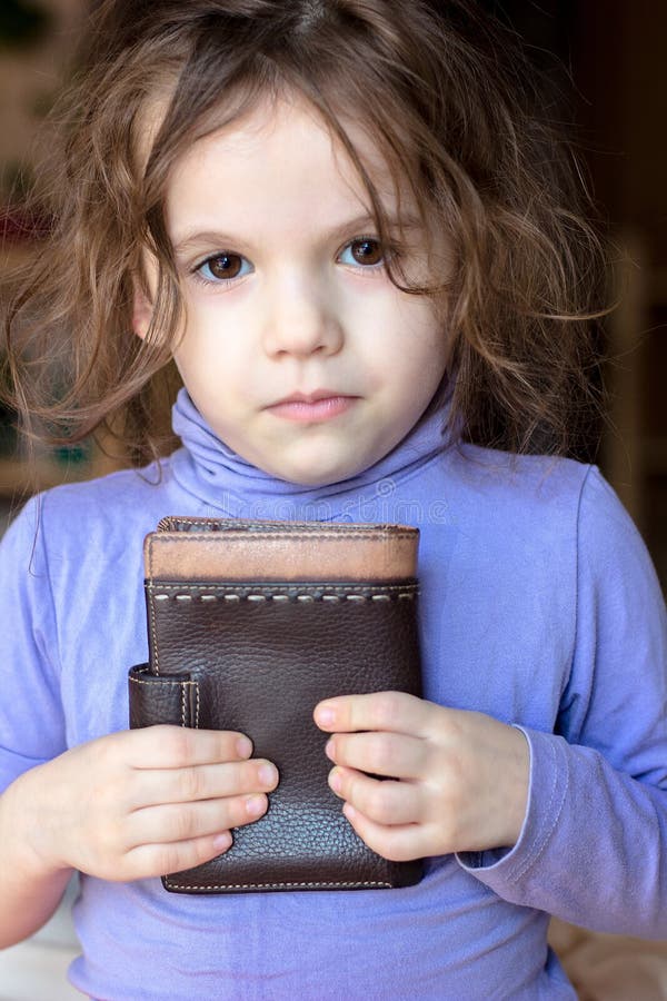 Little Kid Girl Holds Wallet in Hands. Stock Image - Image of wallet ...