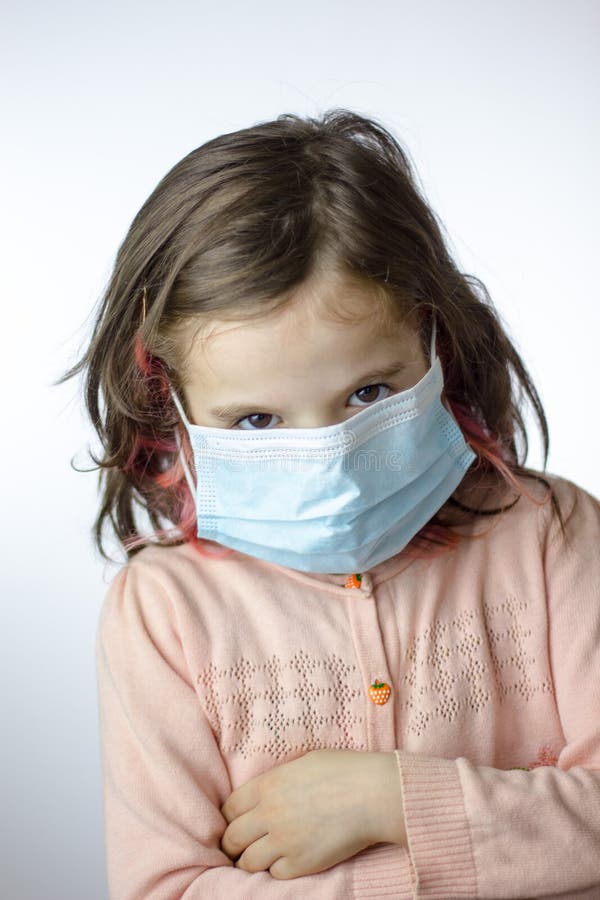 Little Kid Girl with the Mask on Face during Epidemy Stock Photo ...