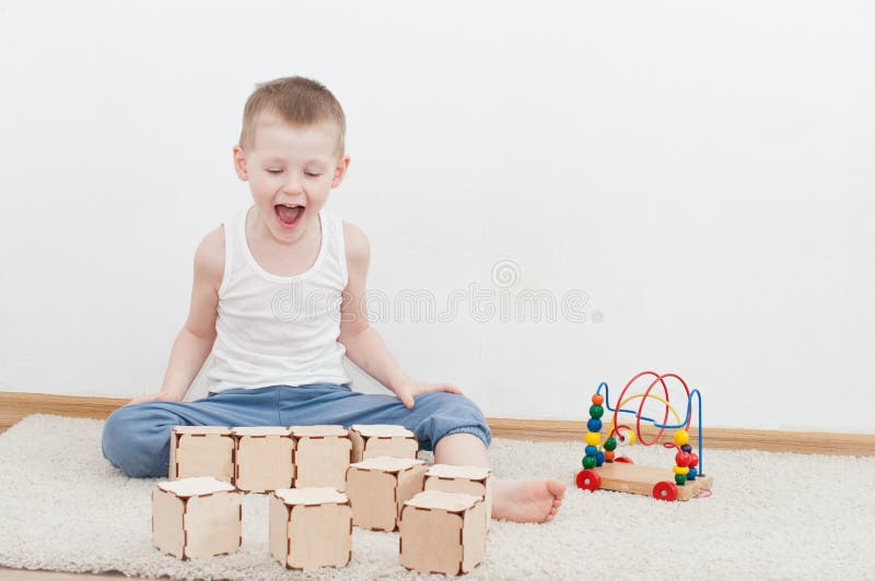 Little Kid is Playing with Blocks Stock Image - Image of home ...