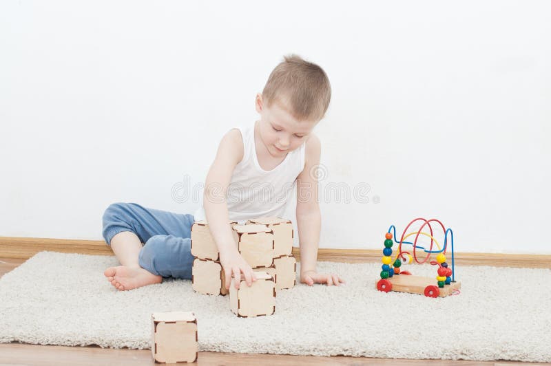 Little Kid is Playing with Blocks Stock Image - Image of labyrinth ...