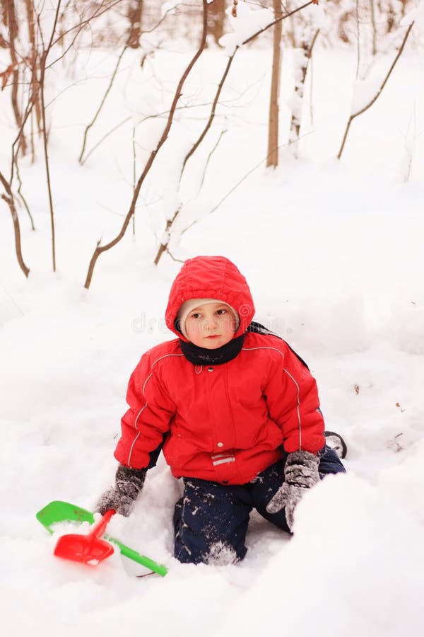 Little Kid in Red Jacket Sitting on Snow Stock Photo - Image of hood ...