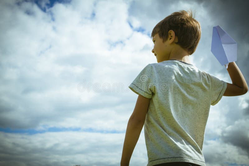 244 Young Boy Throwing Paper Plane Stock Photos - Free & Royalty-Free ...