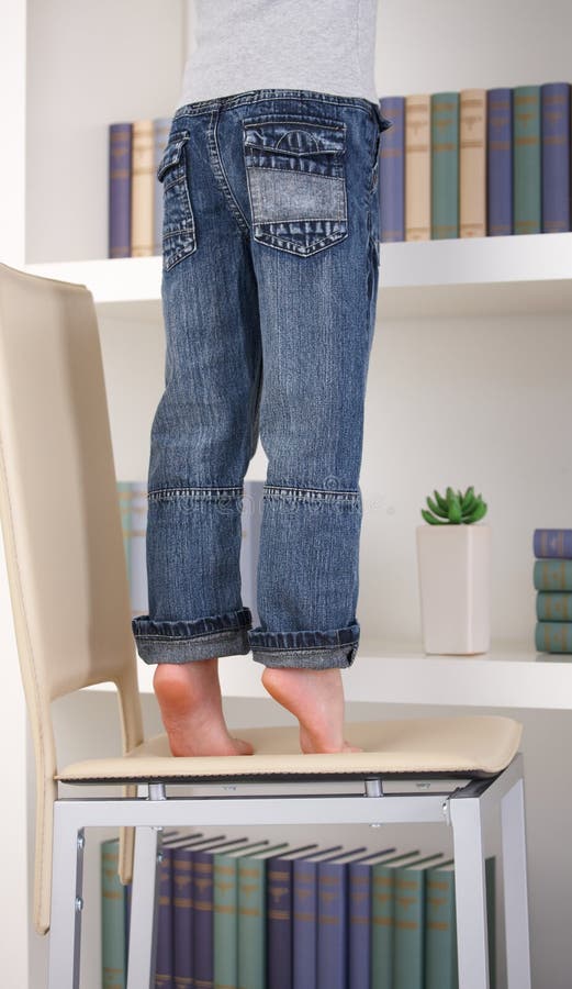 Little Kid Tiptoing To Reach Something on Shelf Stock Image - Image of ...