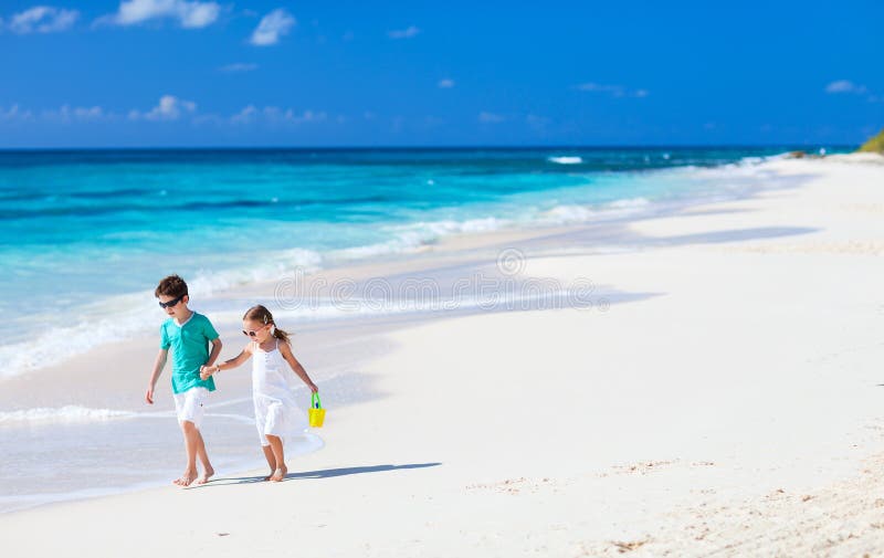 Little kids at beach stock image. Image of little, childhood - 38848135