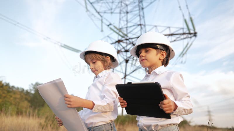 Little Kids Playing As Engineers or Managers with Safety Helmets, Using ...