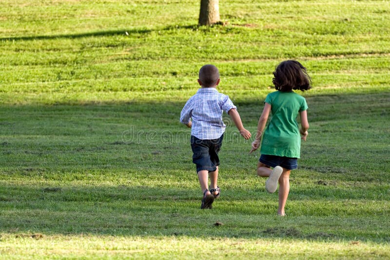 Little Kids Running stock photo. Image of childhood, grass - 13785740