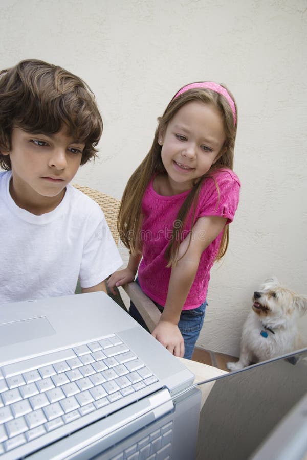 Little Kids Using Laptop stock image. Image of concentration - 29662463
