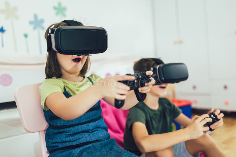 Kids in Virtual Reality Headsets Playing Video Game at Home Stock Image ...