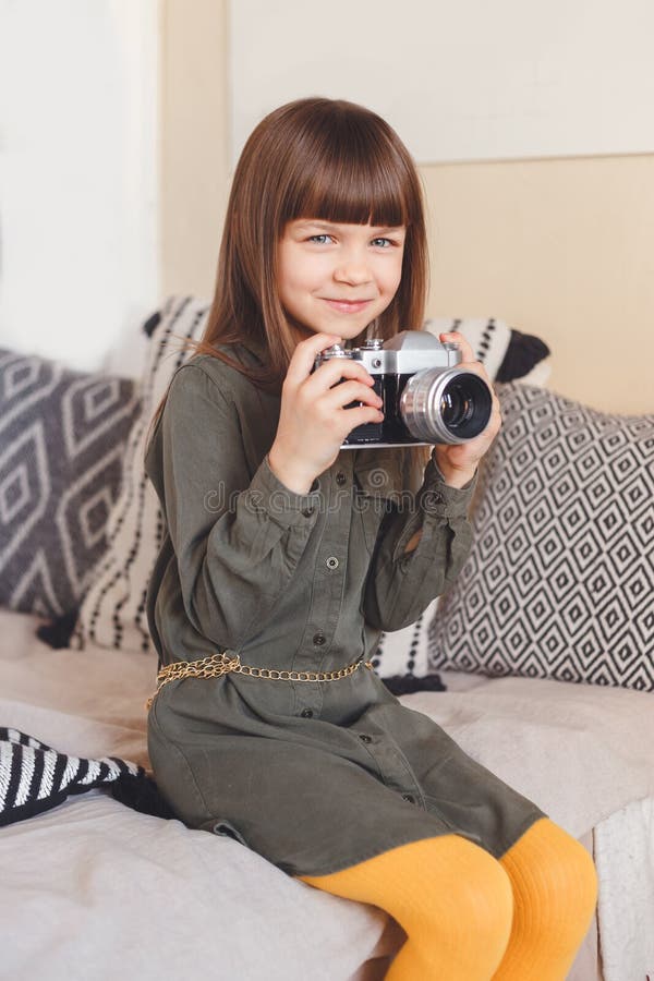 Little Lady Photographer with Camera in Room Stock Photo - Image of ...