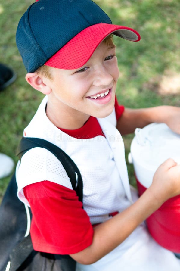 Little League Baseball Player Happy After Game. Stock Photo - Image of ...