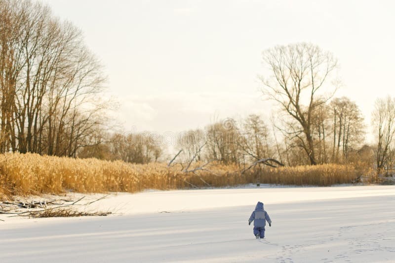 Little Lonely Boy in Winter on Ice in the Snow Stock Image - Image of ...