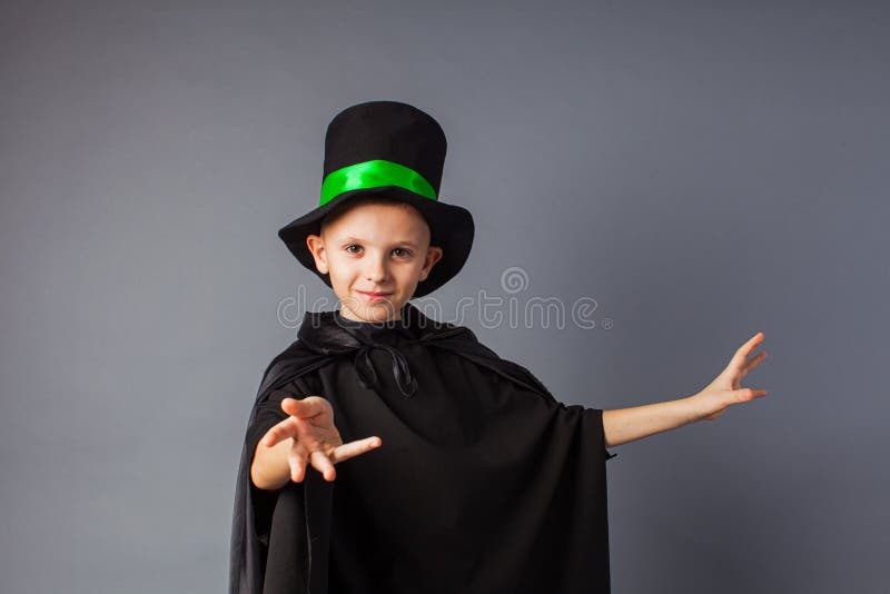 Little Magician Does Tricks. Little Boy Wears Costume Magician and ...