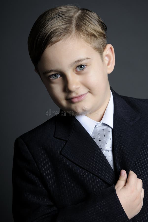 Little boy stock photo. Image of cheerful, chairman, chair - 9828816