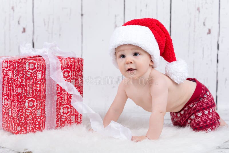 Little X-mas Baby with Gift Stock Image - Image of holiday, laying ...